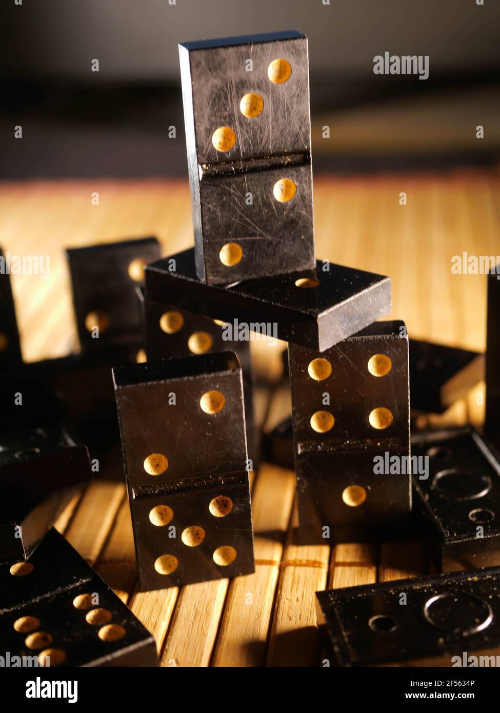 Domino formed in different ways, black, on white background. Each piece ...