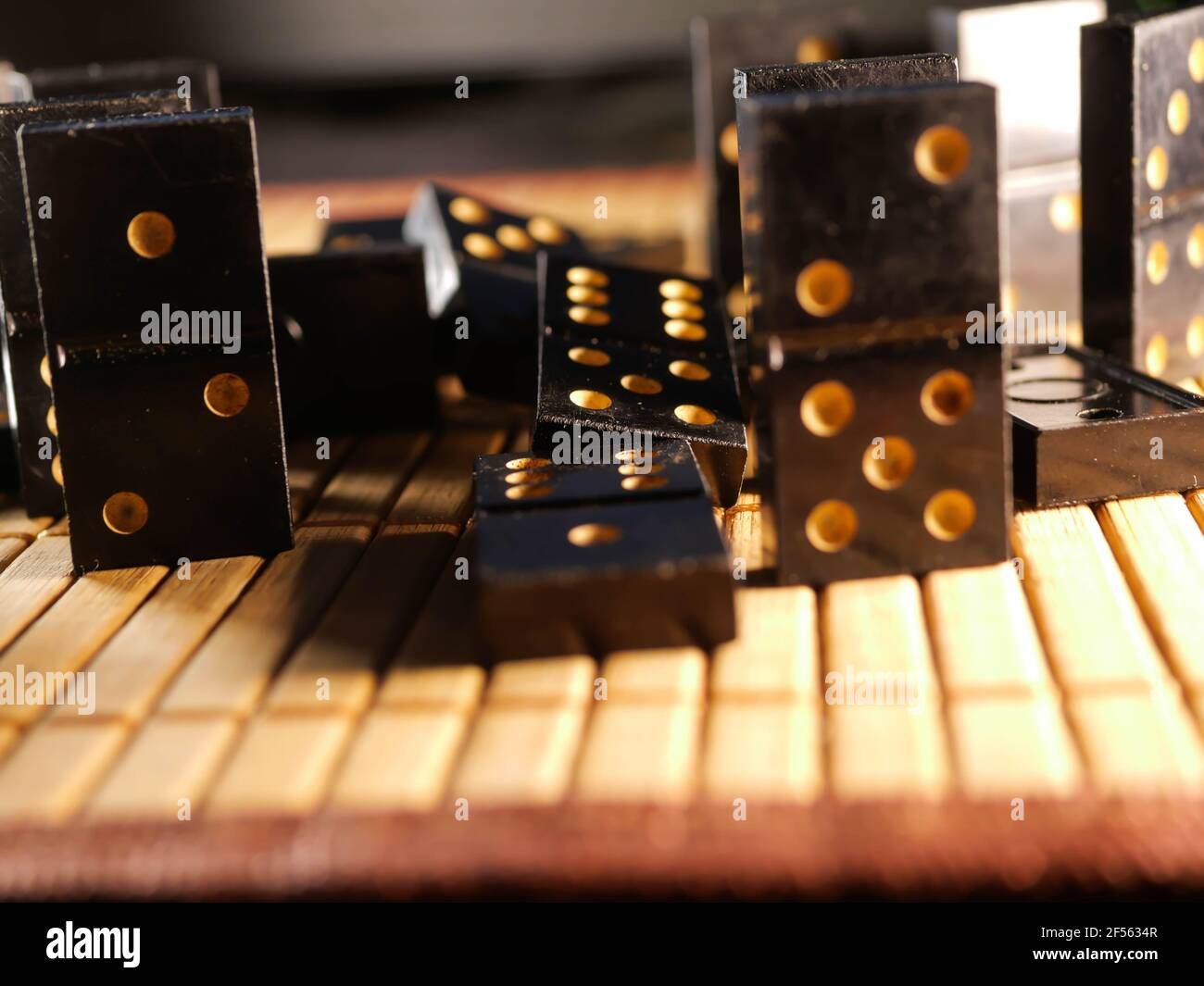 Domino formed in different ways, black, on white background. Each piece ...