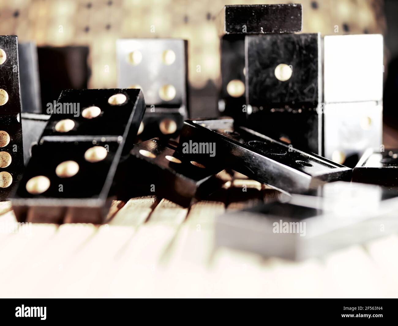 Domino formed in different ways, black, on white background. Each piece ...