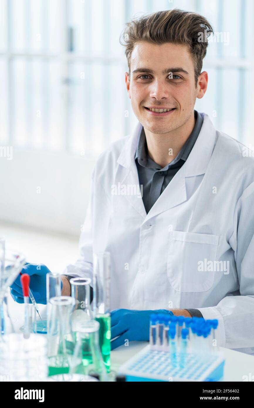 Scientist sitting at his desk hi-res stock photography and images - Alamy