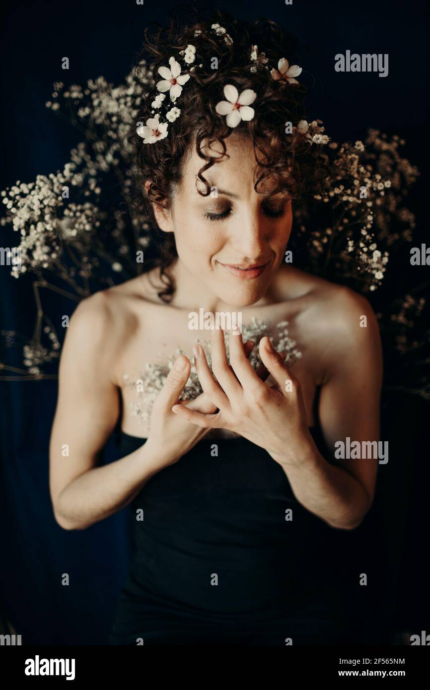 Woman wearing white off shoulder hi-res stock photography and images ...