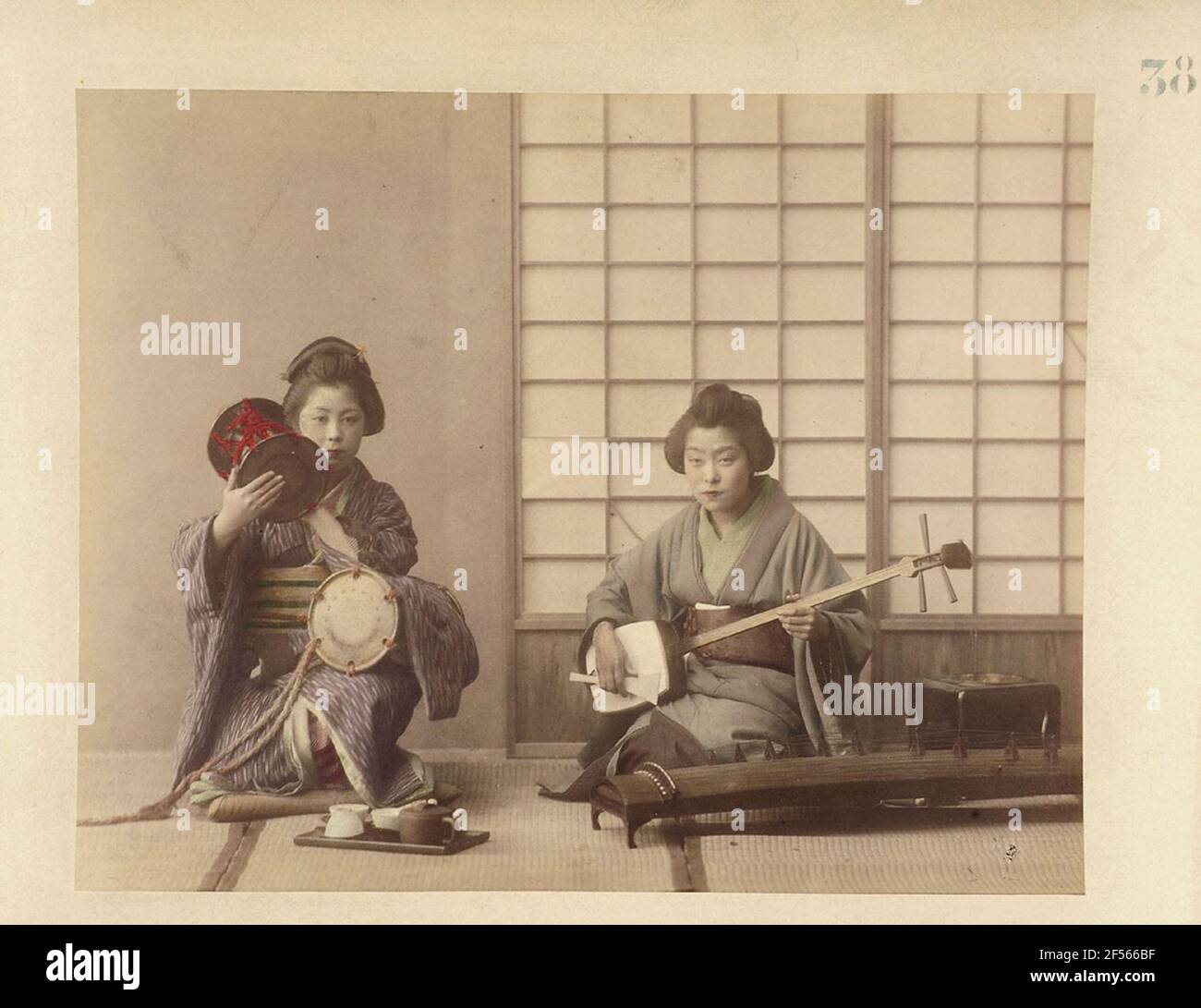Two Japanese instruments playing Stock Photo - Alamy