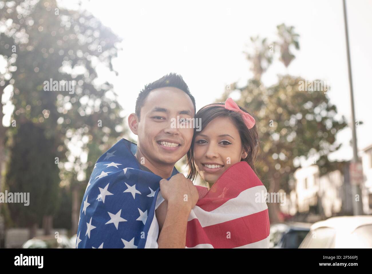 Couple wrapped in american flag hi-res stock photography and images - Alamy