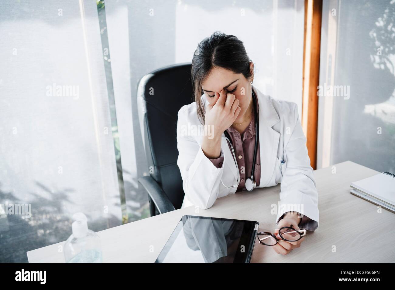 Doctor tired woman hi-res stock photography and images - Alamy