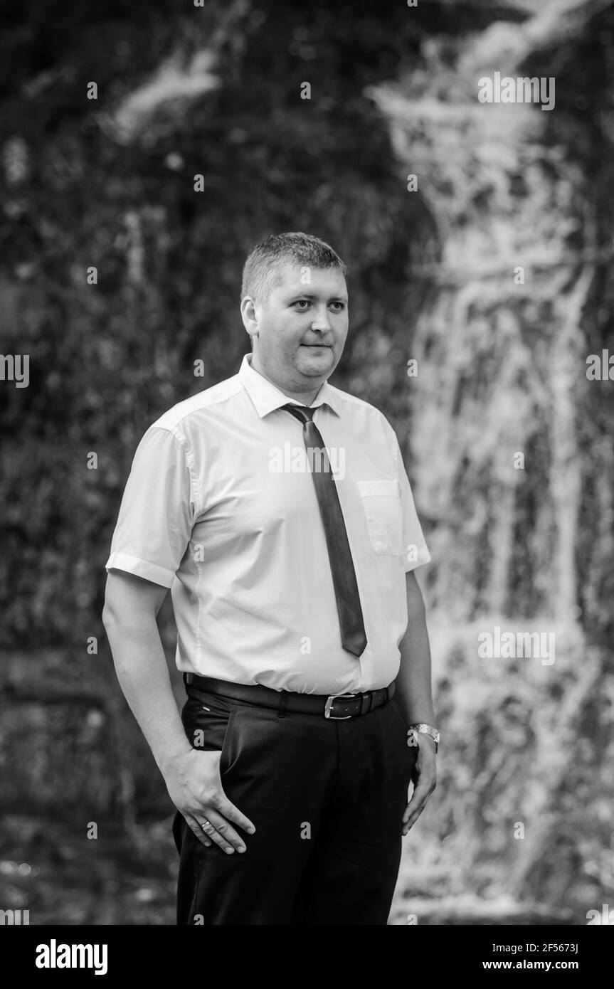 Man woman against background Black and White Stock Photos & Images - Alamy