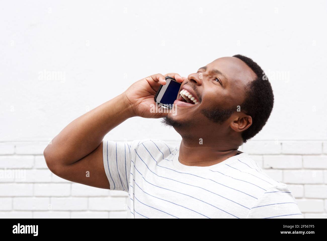 Laughing black man hi-res stock photography and images - Alamy