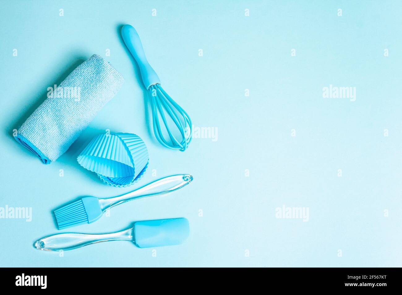 Baking concept isolated on pastel blue background. A set of spatula ...