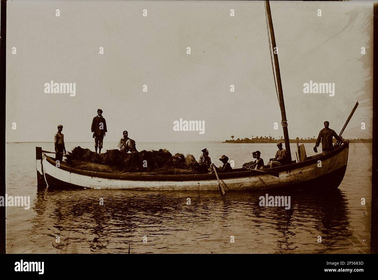 Africans in a transport boat Stock Photo - Alamy