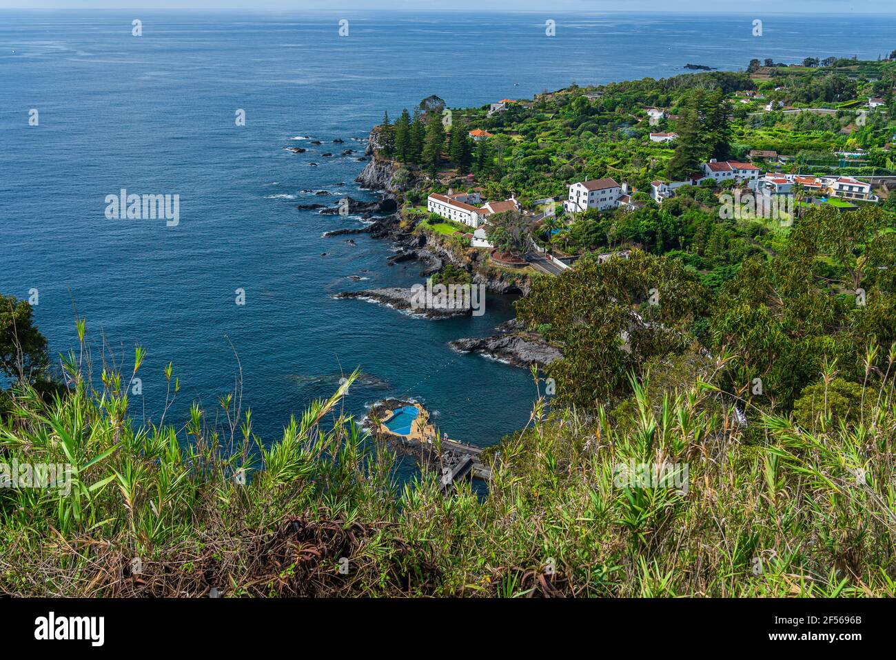 Viewpoint to Caloura bay with the natural pool in Sao Miguel Island ...
