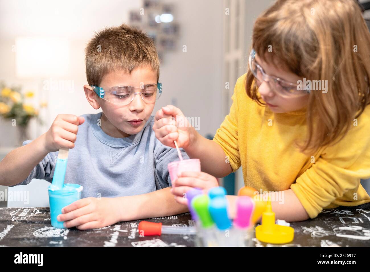 Child making slime hi-res stock photography and images - Alamy