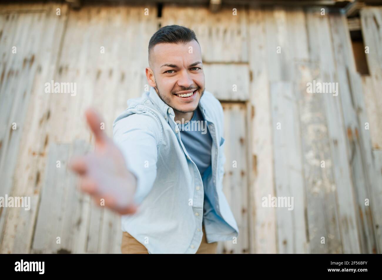 Man stretching against wall hi-res stock photography and images - Alamy
