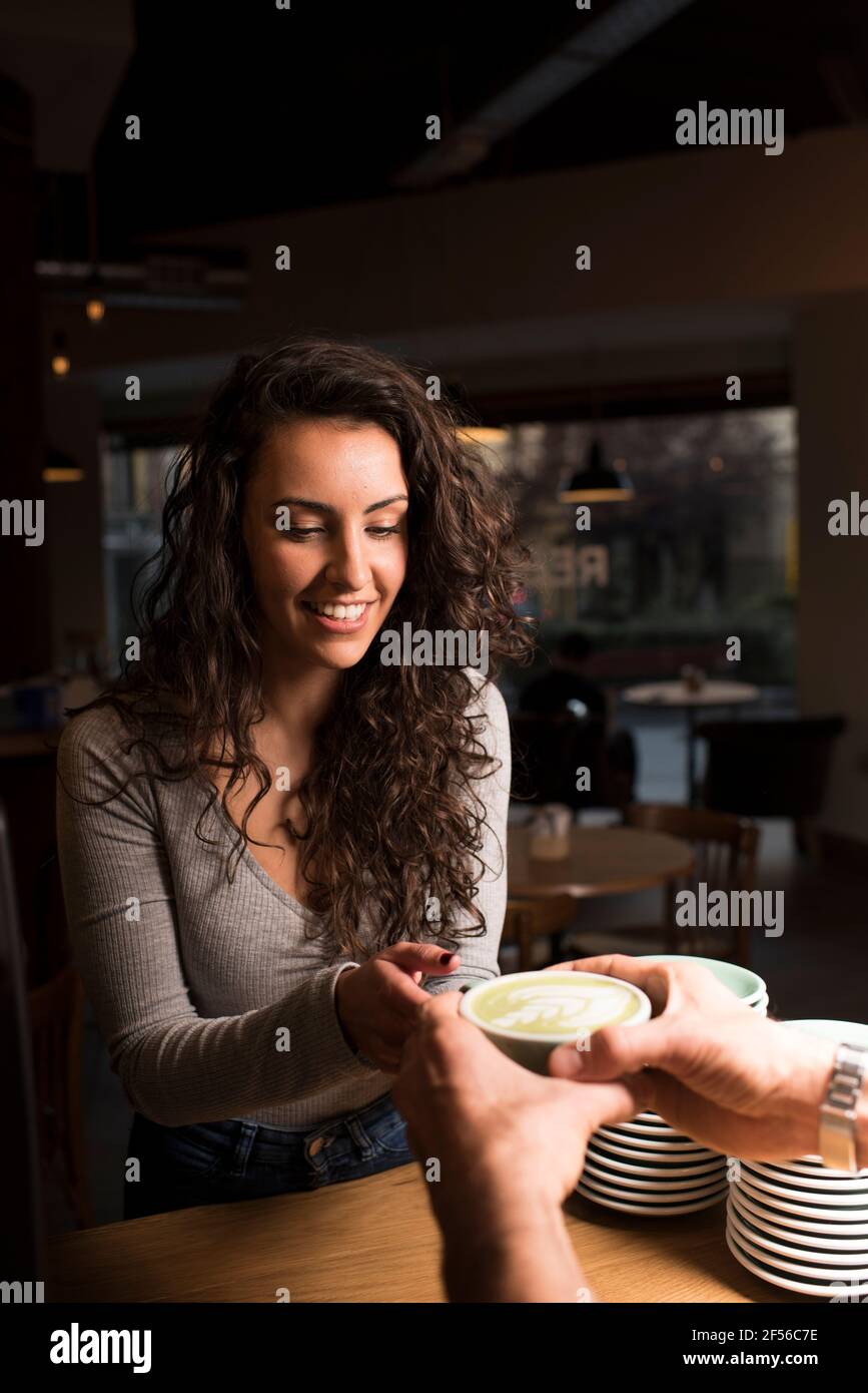 Smiling customer service taking hi-res stock photography and images - Alamy