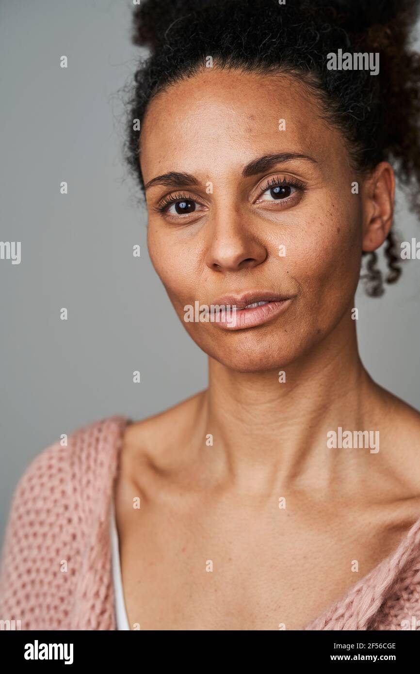 Mixed race woman face serious hi-res stock photography and images - Alamy