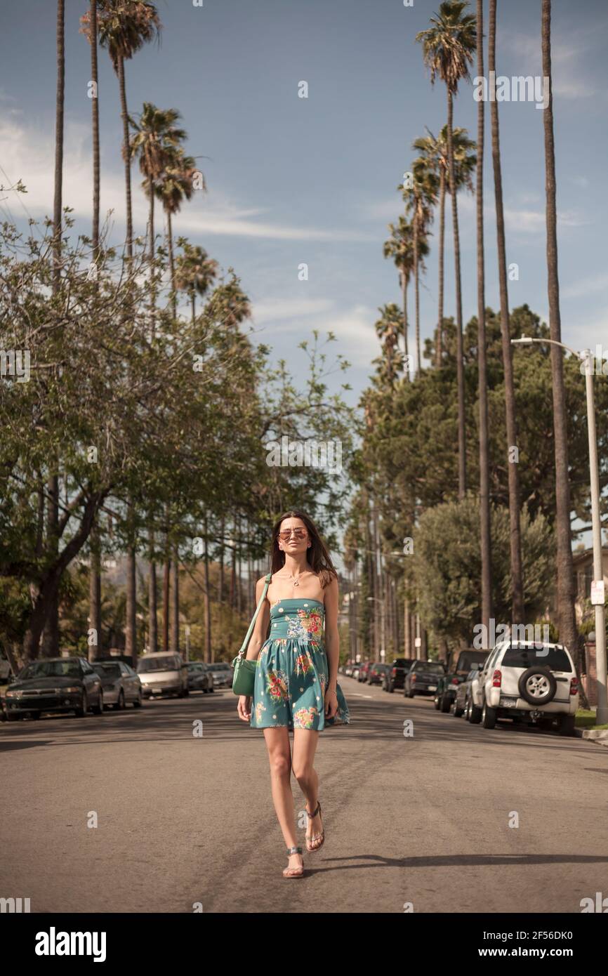 Woman walking street hi-res stock photography and images - Alamy