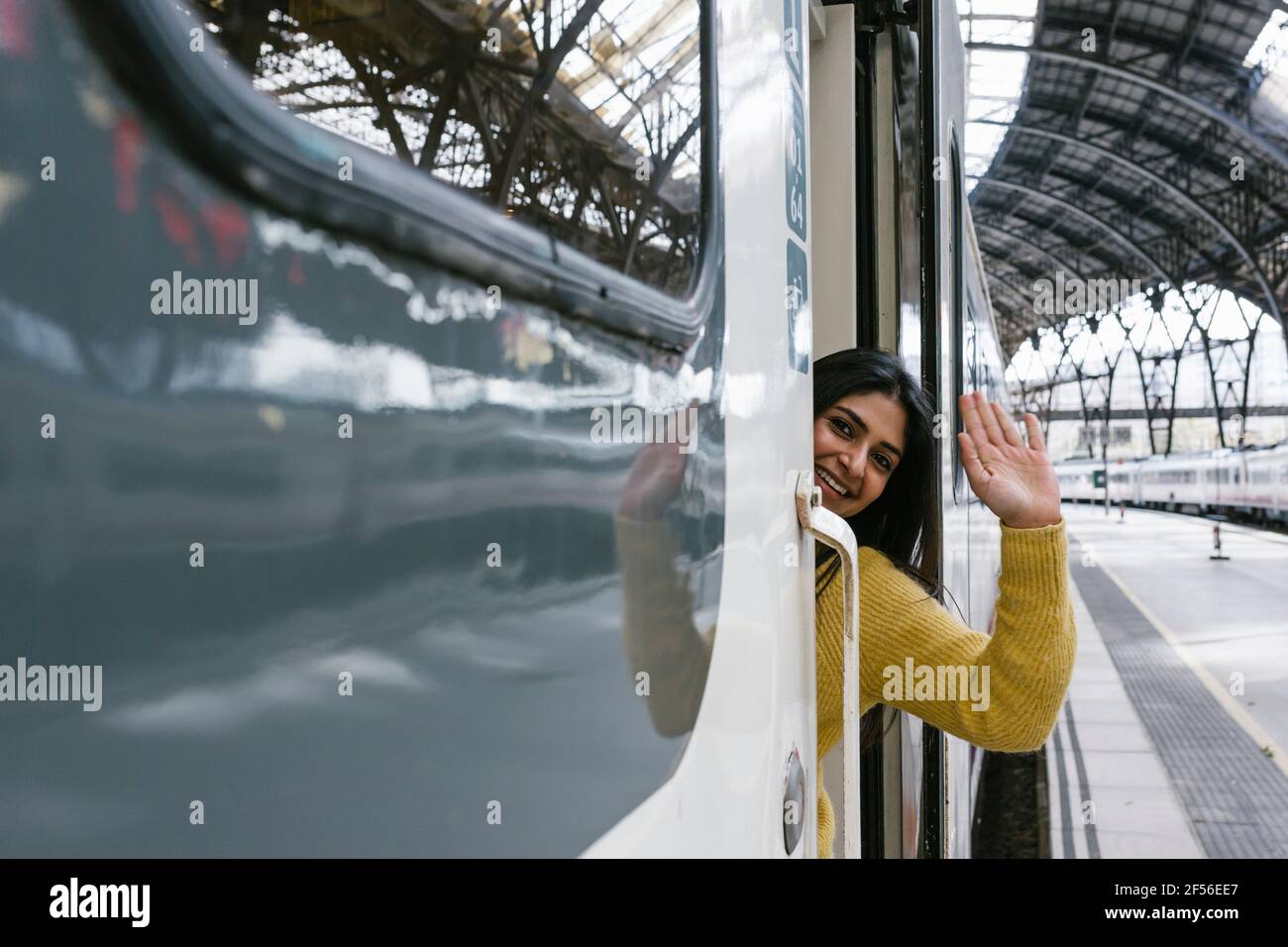 Indian woman train station hi-res stock photography and images - Alamy