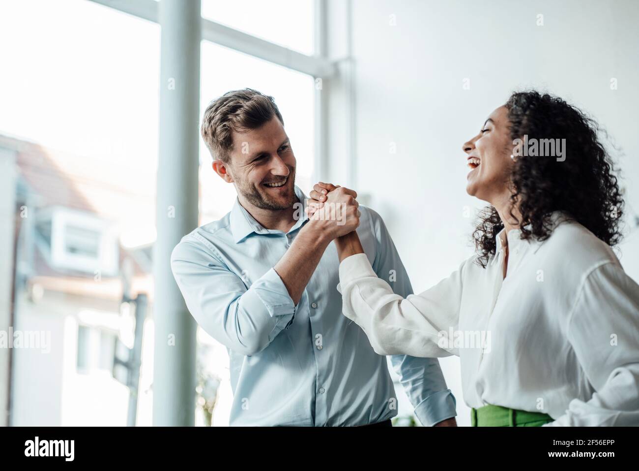 Smiling hands hi-res stock photography and images - Alamy
