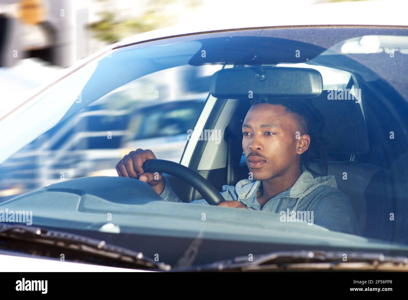 African man driving hi-res stock photography and images - Alamy