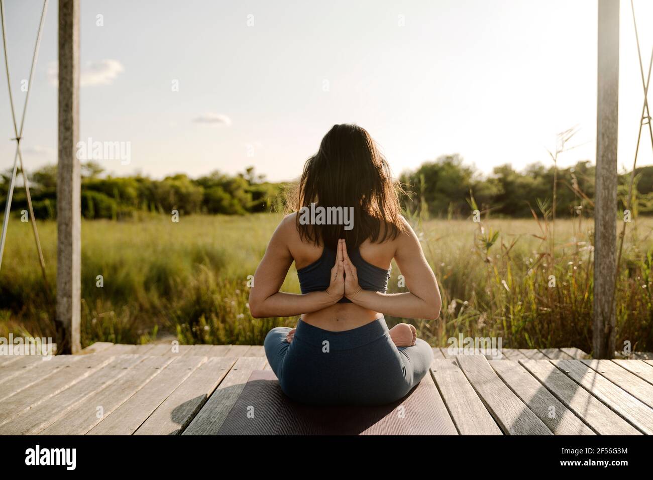 Woman hands clasped behind back hi-res stock photography and images - Alamy