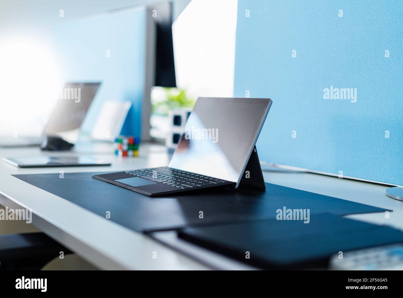 Digital tablets on desk at office Stock Photo - Alamy