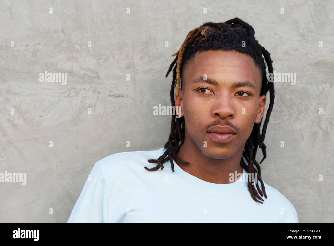 Guy dreadlocks serious expression hi-res stock photography and images - Alamy