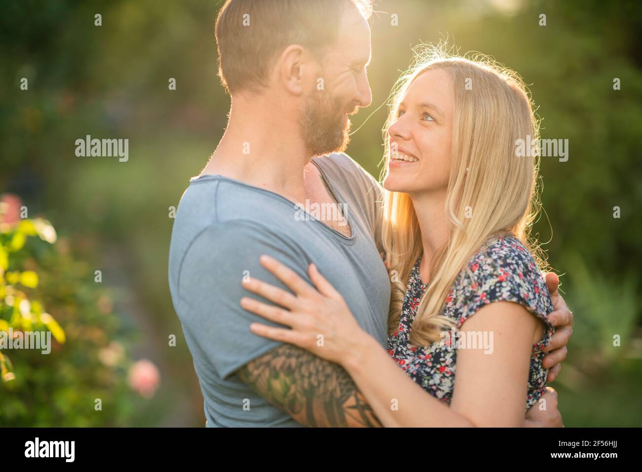 Happy couple embracing other hi-res stock photography and images - Alamy