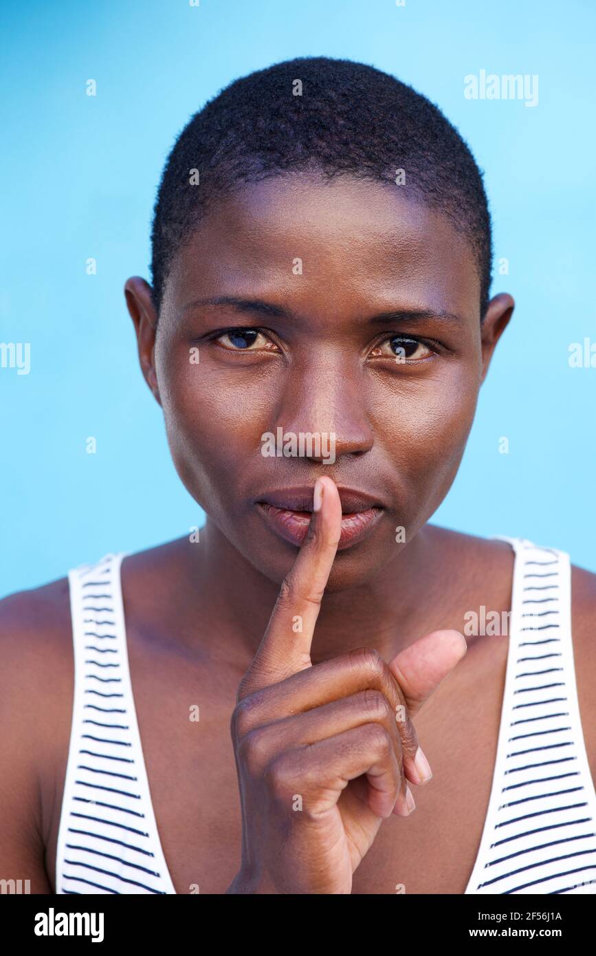 Whisper finger close hi-res stock photography and images - Alamy