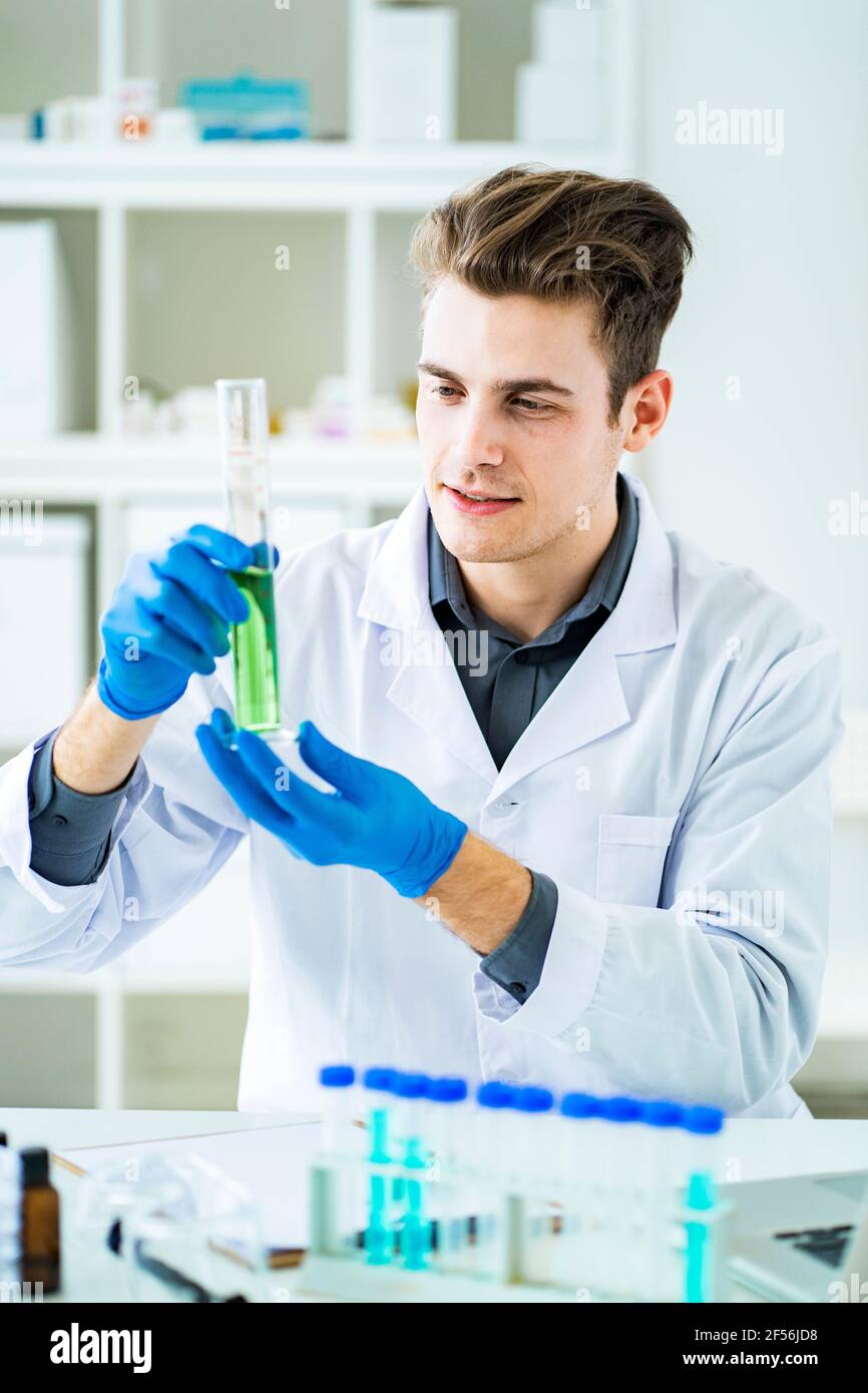 Handsome scientist hi-res stock photography and images - Alamy