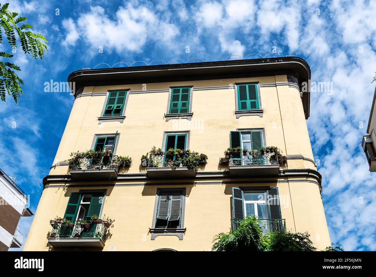 Facade of an old classic yellow building in the historical center of ...