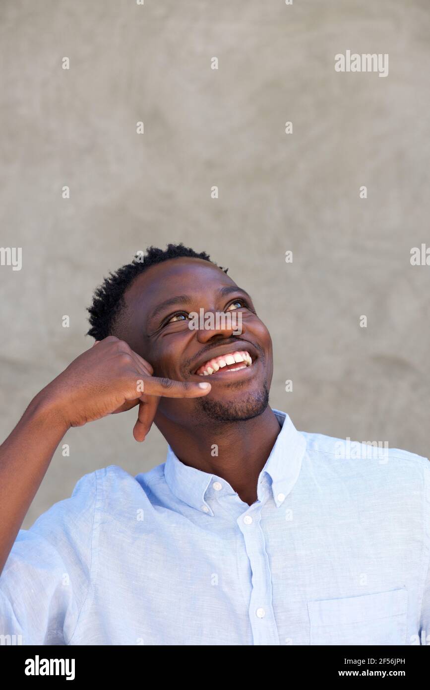 African american man call me sign hi-res stock photography and images ...