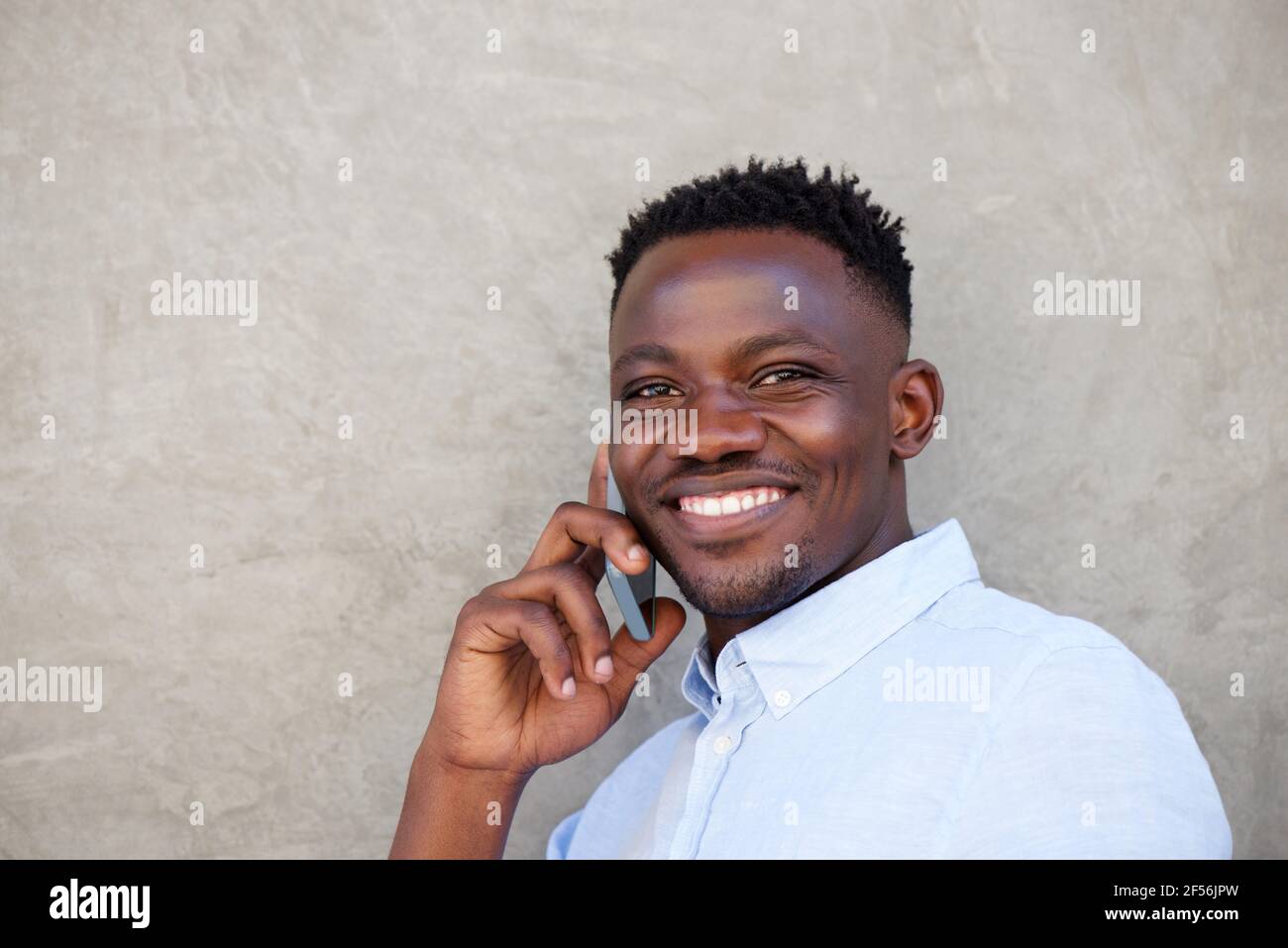 Black guy making phone call hi-res stock photography and images - Alamy