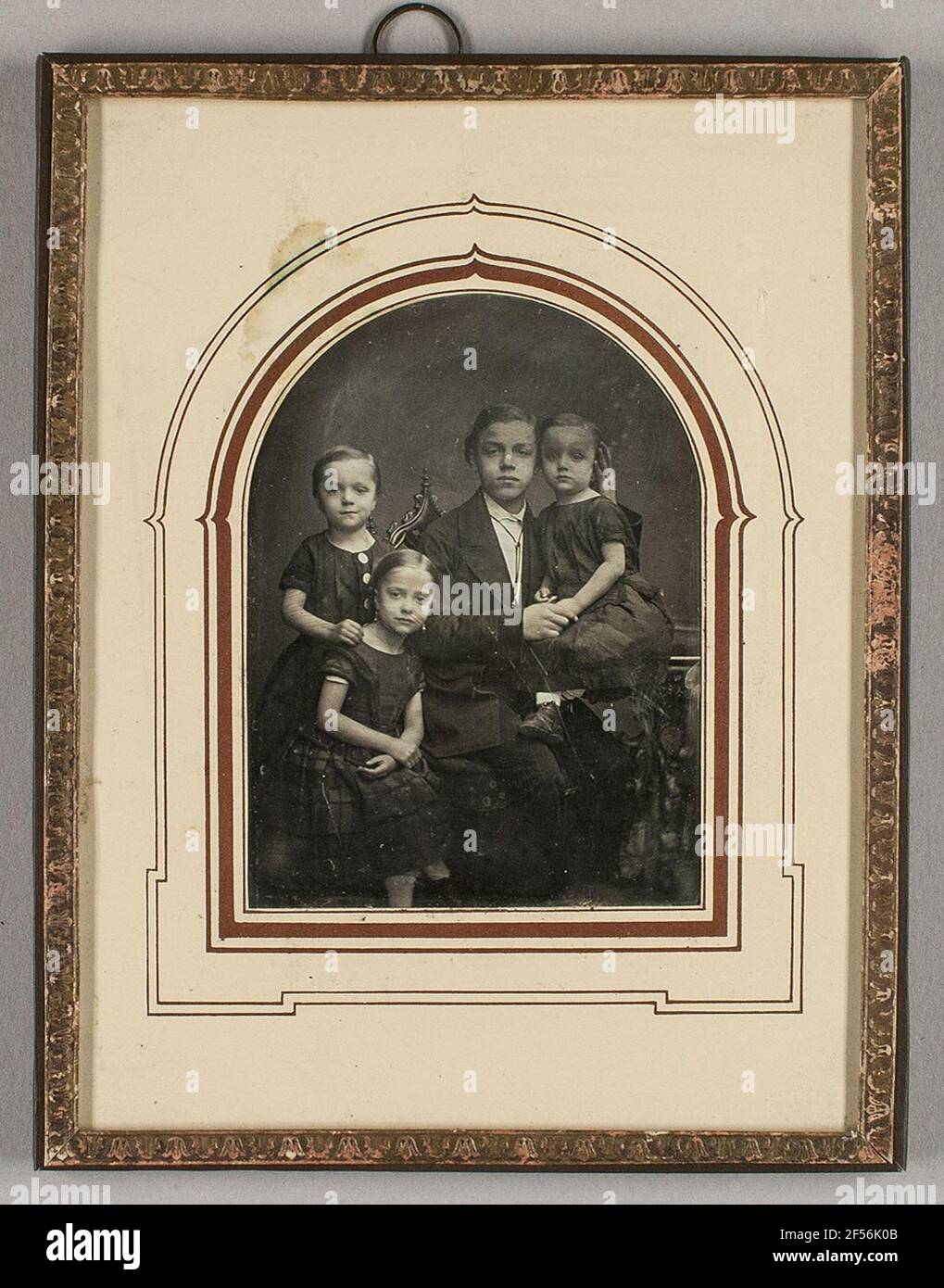 Four siblings Stock Photo - Alamy