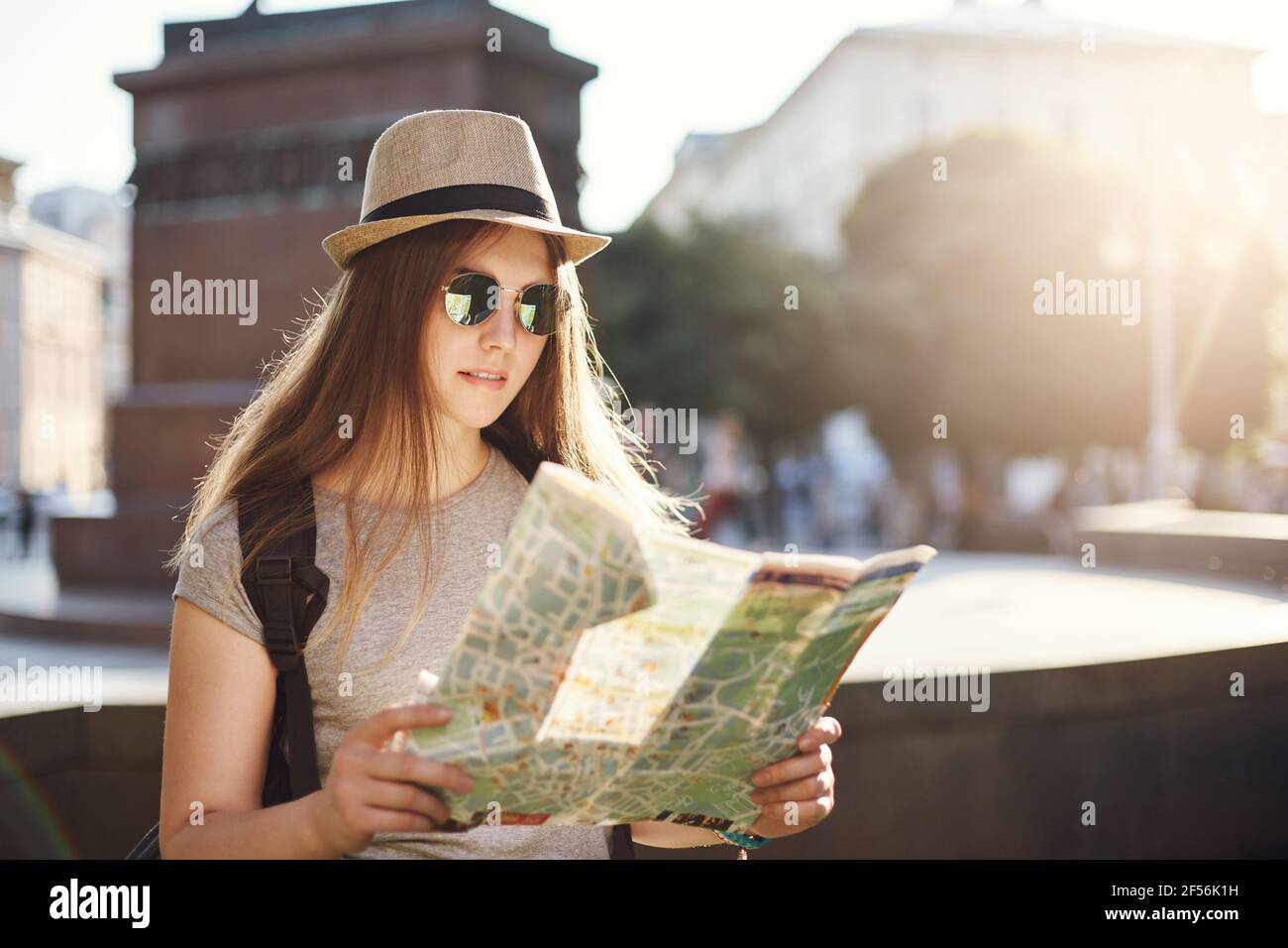 Girl holding world map hi-res stock photography and images - Alamy