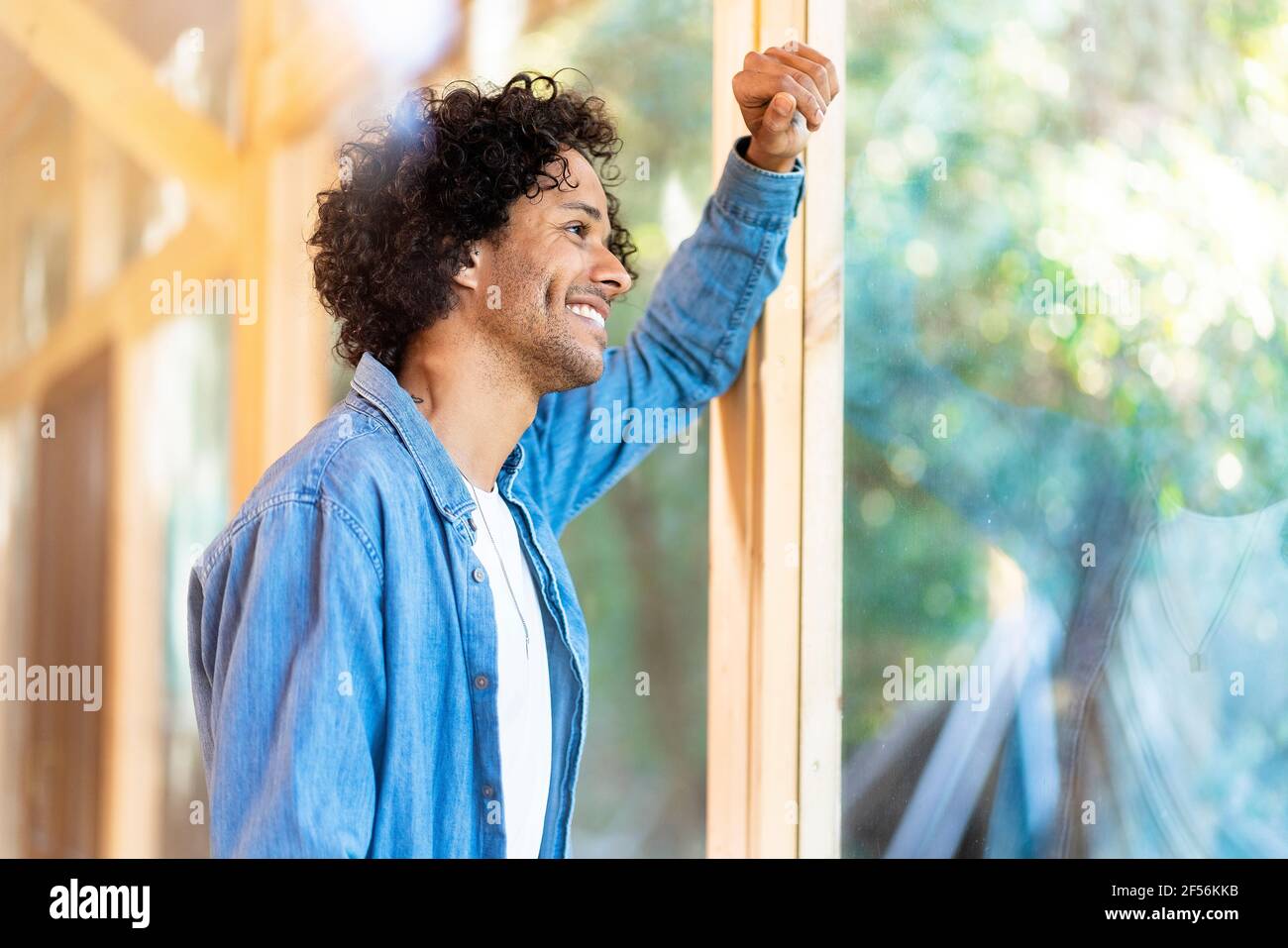 Glass window man building hi-res stock photography and images - Alamy