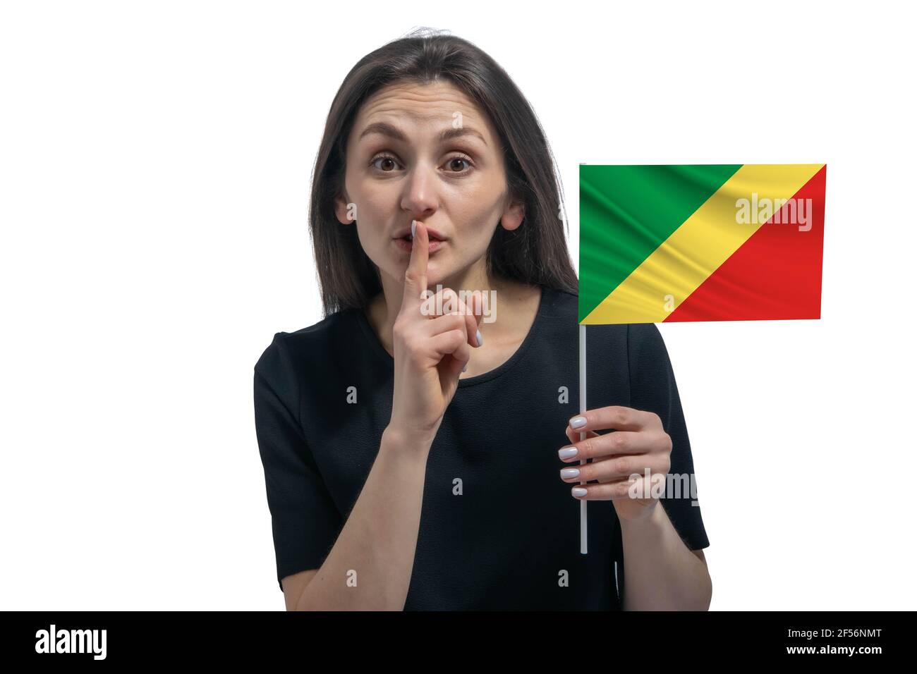 Happy young white woman holding flag of Republic of the Congo and holds ...
