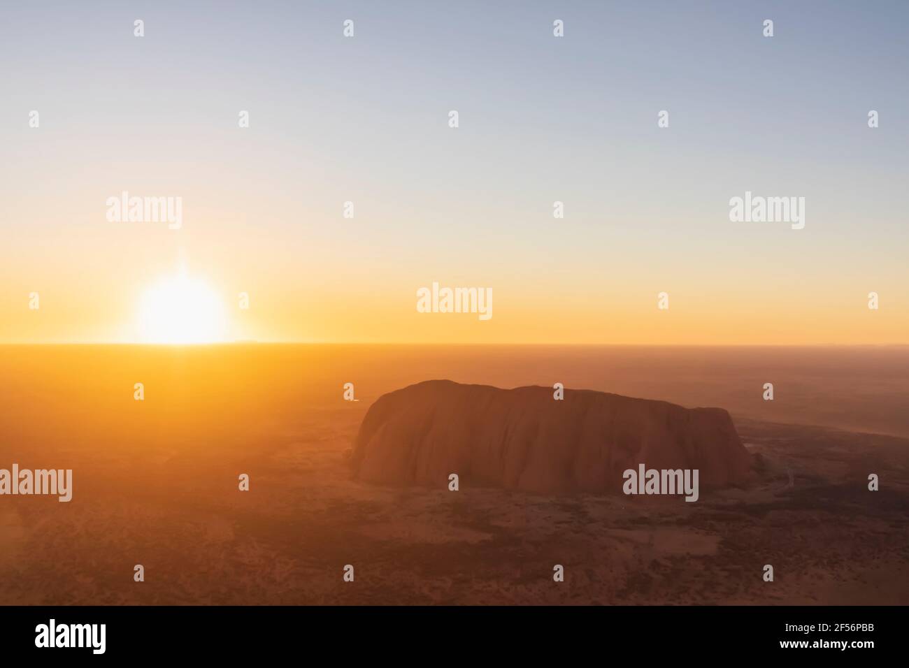 Australia, Northern Territory, Aerial view of Uluru at sunrise Stock ...