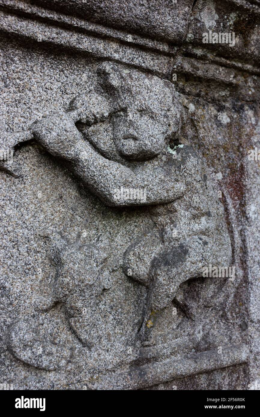 Granite bas-relief worn by the past of the time, in Galicia Spain Stock ...