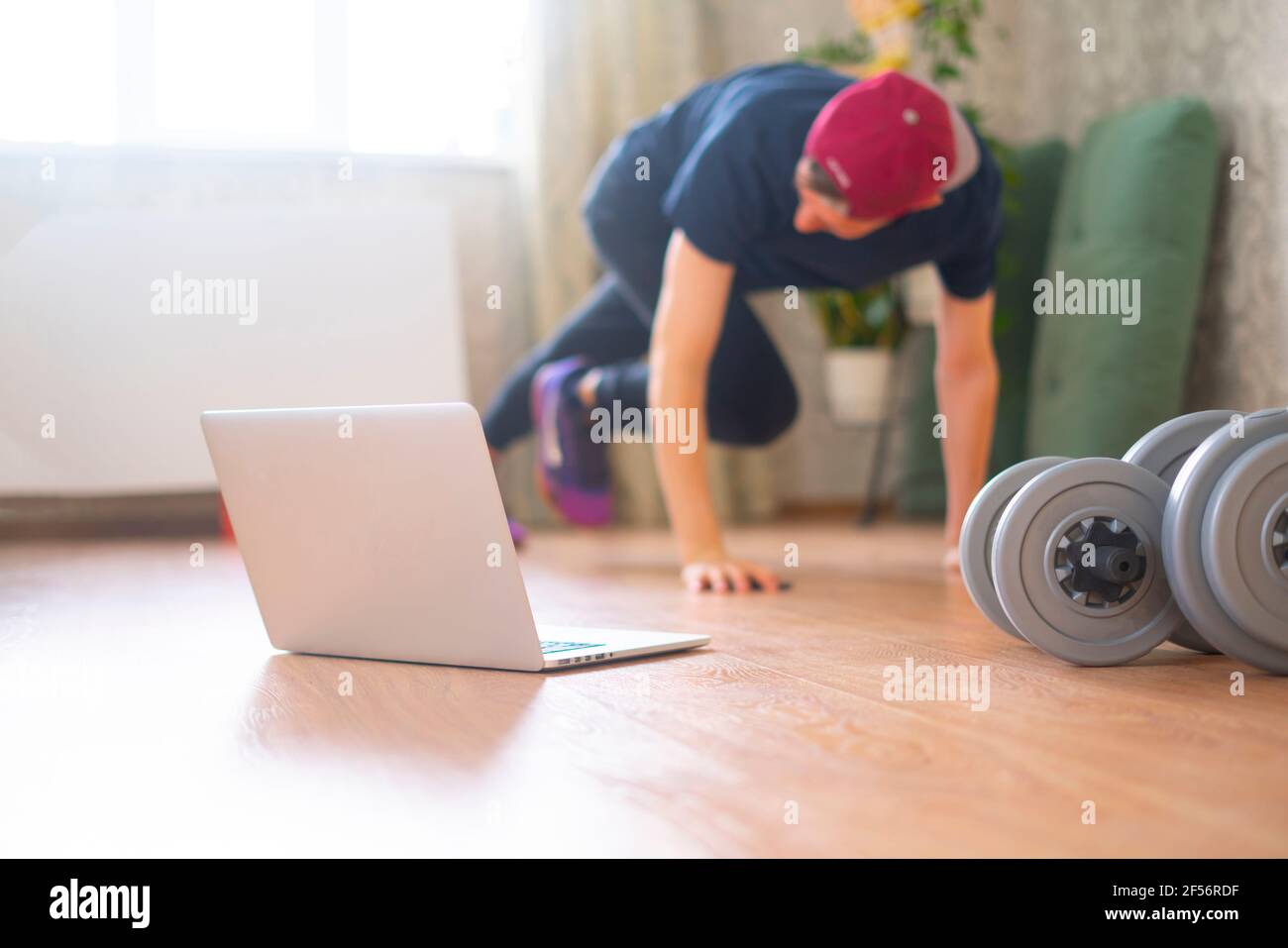 the online sport practice, doing fitness exercises at home with onling ...