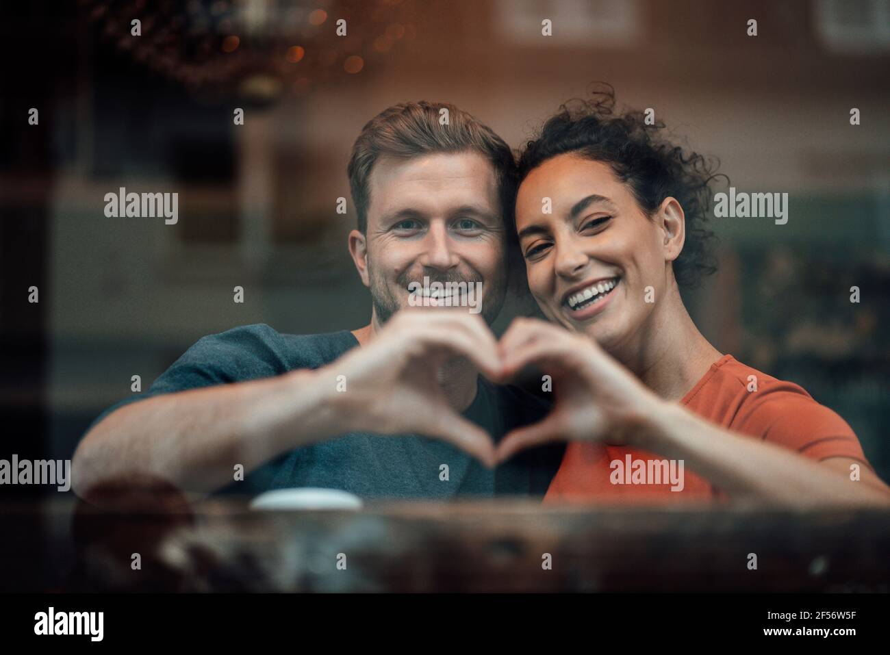 Couple hand heart hi-res stock photography and images - Alamy