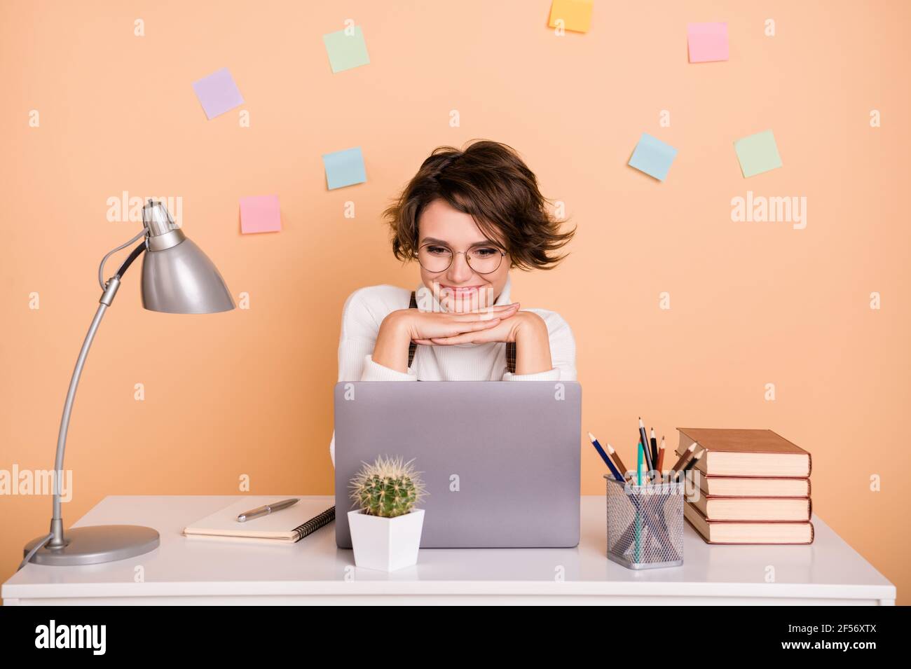 Photo Of Optimistic Nice Short Hairdo Girl Sit Look Laptop Wear