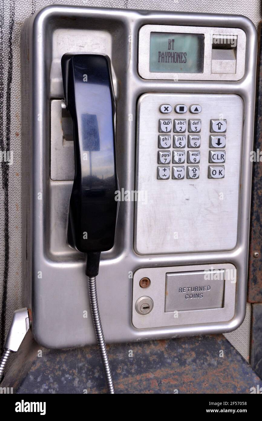 A public press button pay phone on a street in Manchester, England ...