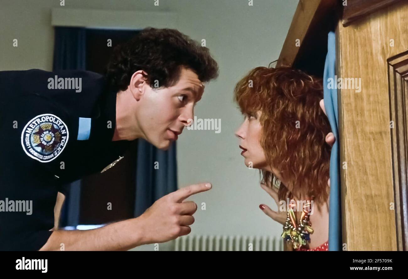 USA. Steve Guttenberg and Georgina Spelvin in a scene the (C)Warner ...