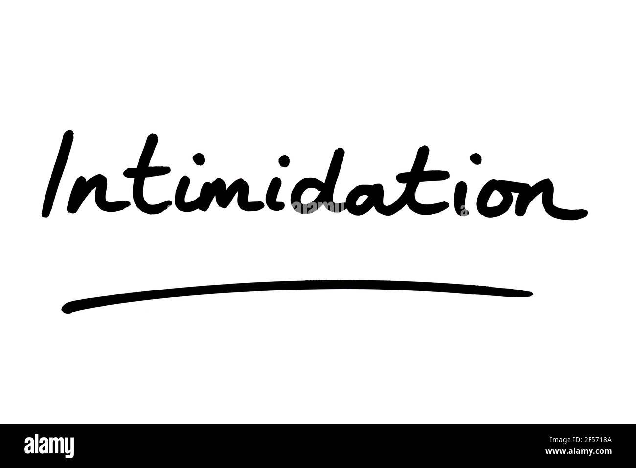 Intimidation, handwritten on a white background Stock Photo - Alamy
