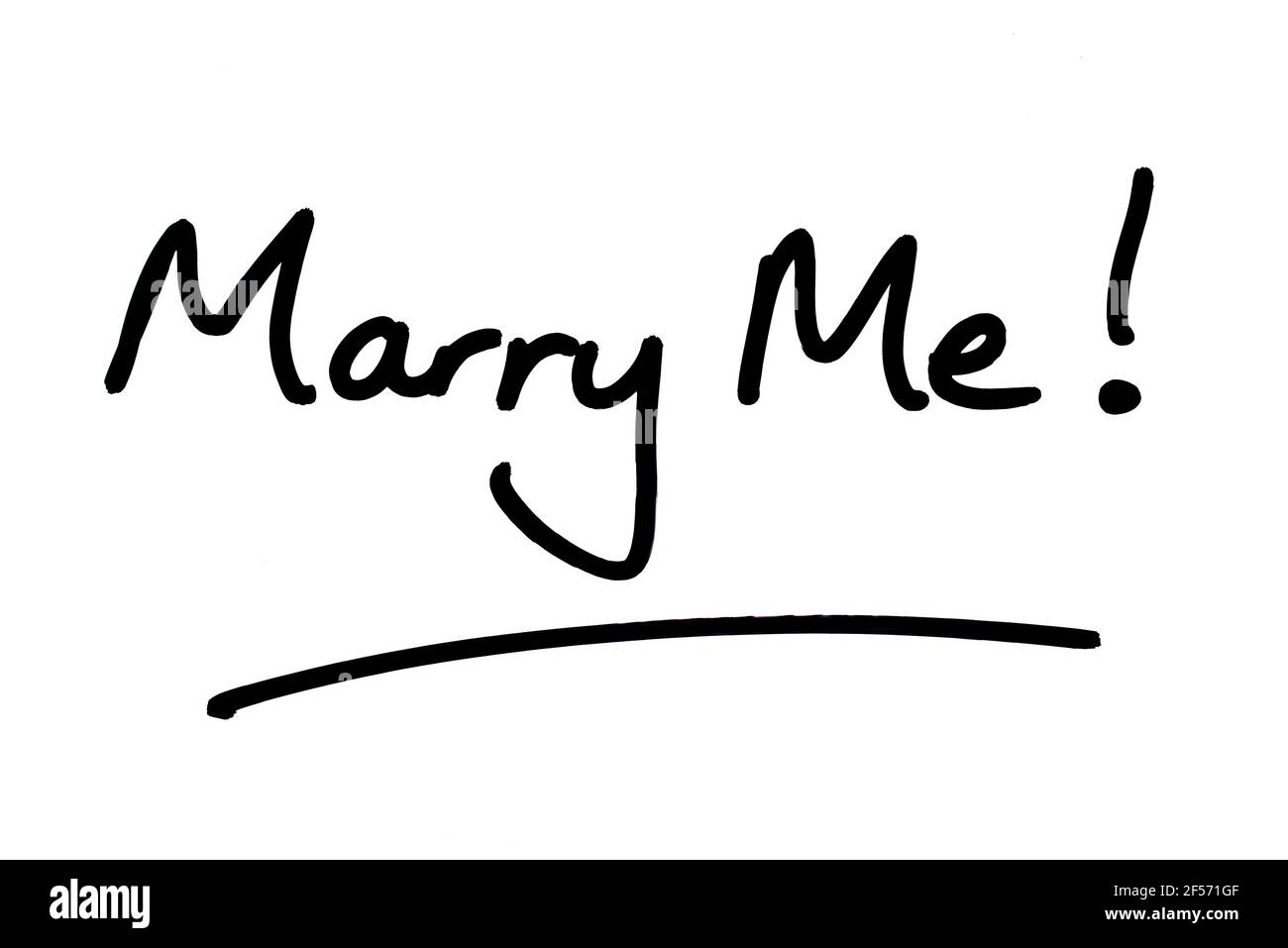 Marry Me! handwritten on a white background Stock Photo - Alamy
