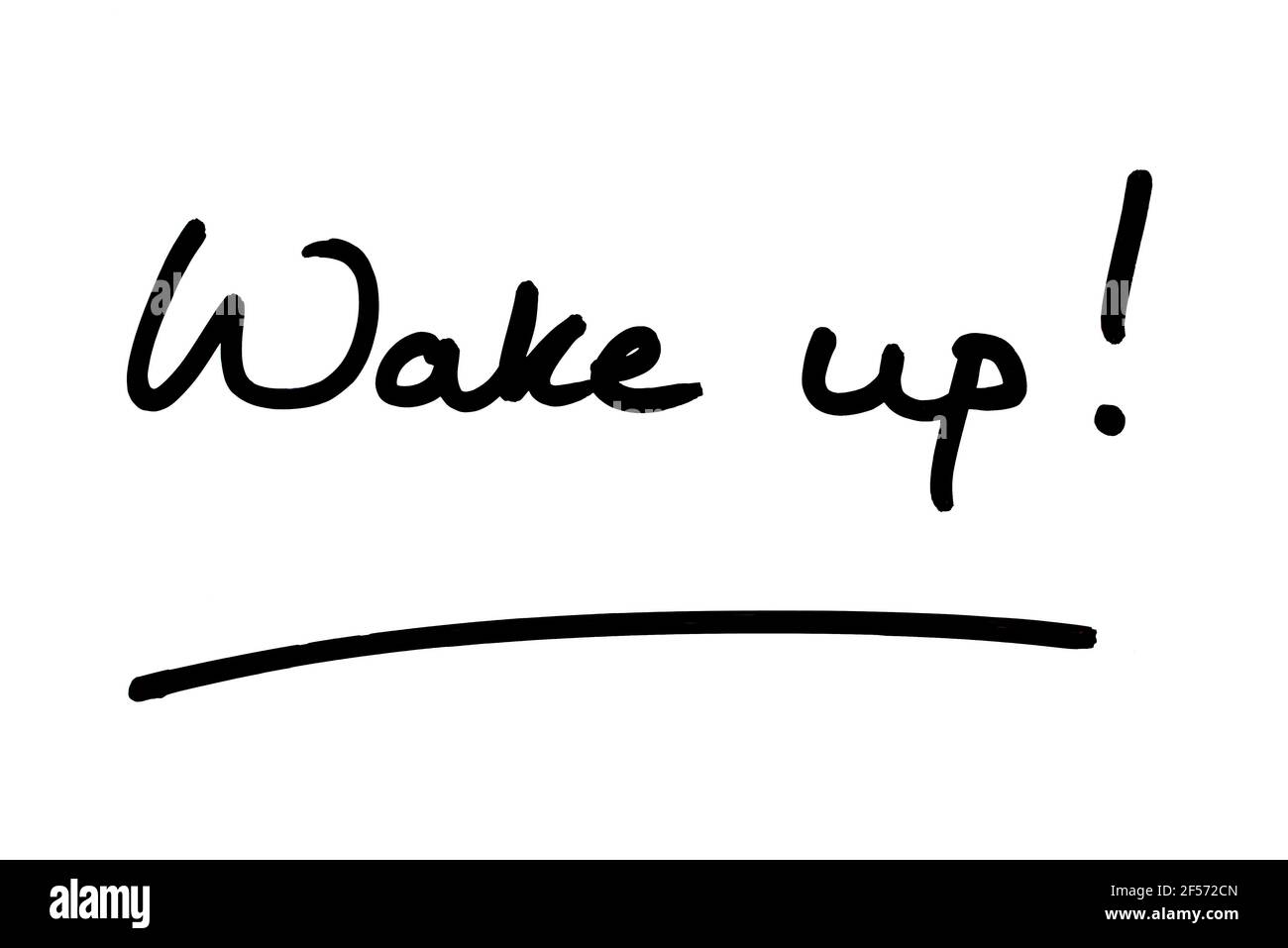 Wake up! handwritten on a white background Stock Photo - Alamy