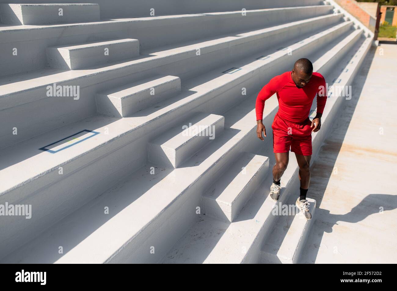 Man running up stairs from above hi-res stock photography and images ...