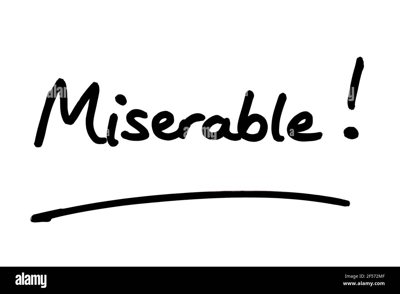Miserable! handwritten on a white background Stock Photo - Alamy
