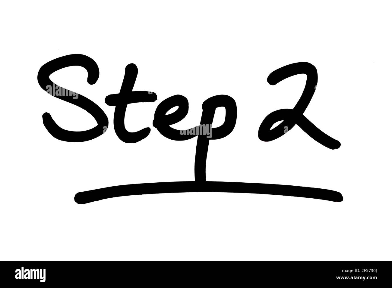 Step 2, handwritten on a white background Stock Photo - Alamy