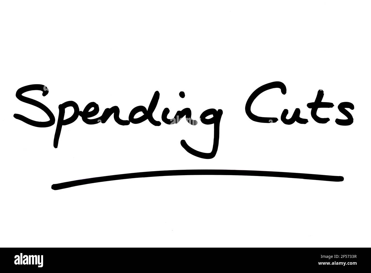 Spending Cuts, handwritten on a white background Stock Photo - Alamy