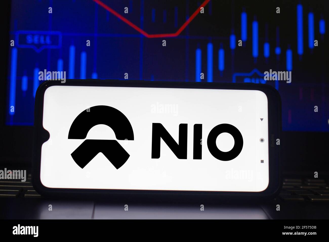 In this photo illustration a NIO logo seen displayed on a smartphone ...