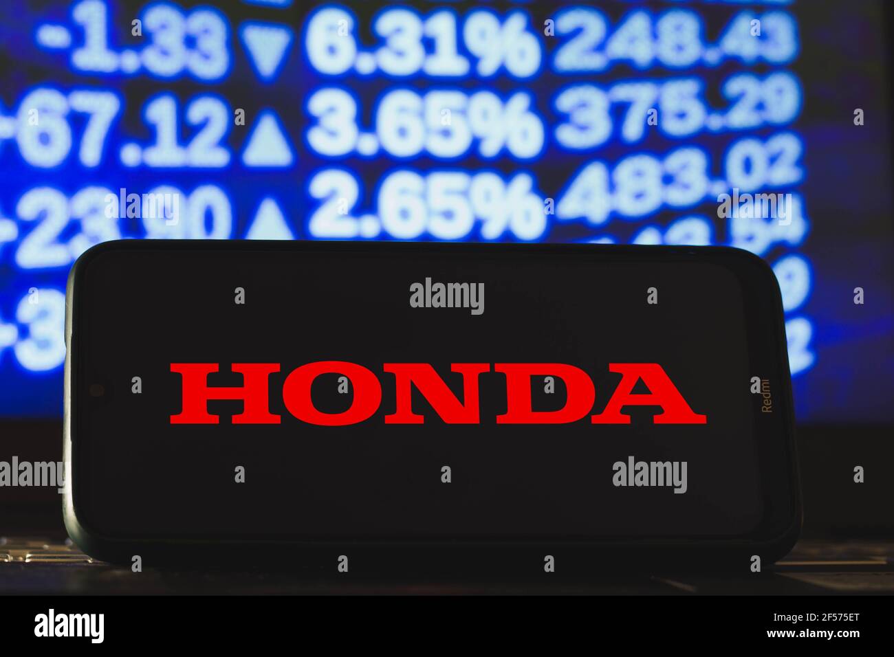 In this photo illustration a Honda Motor Company logo seen displayed on ...